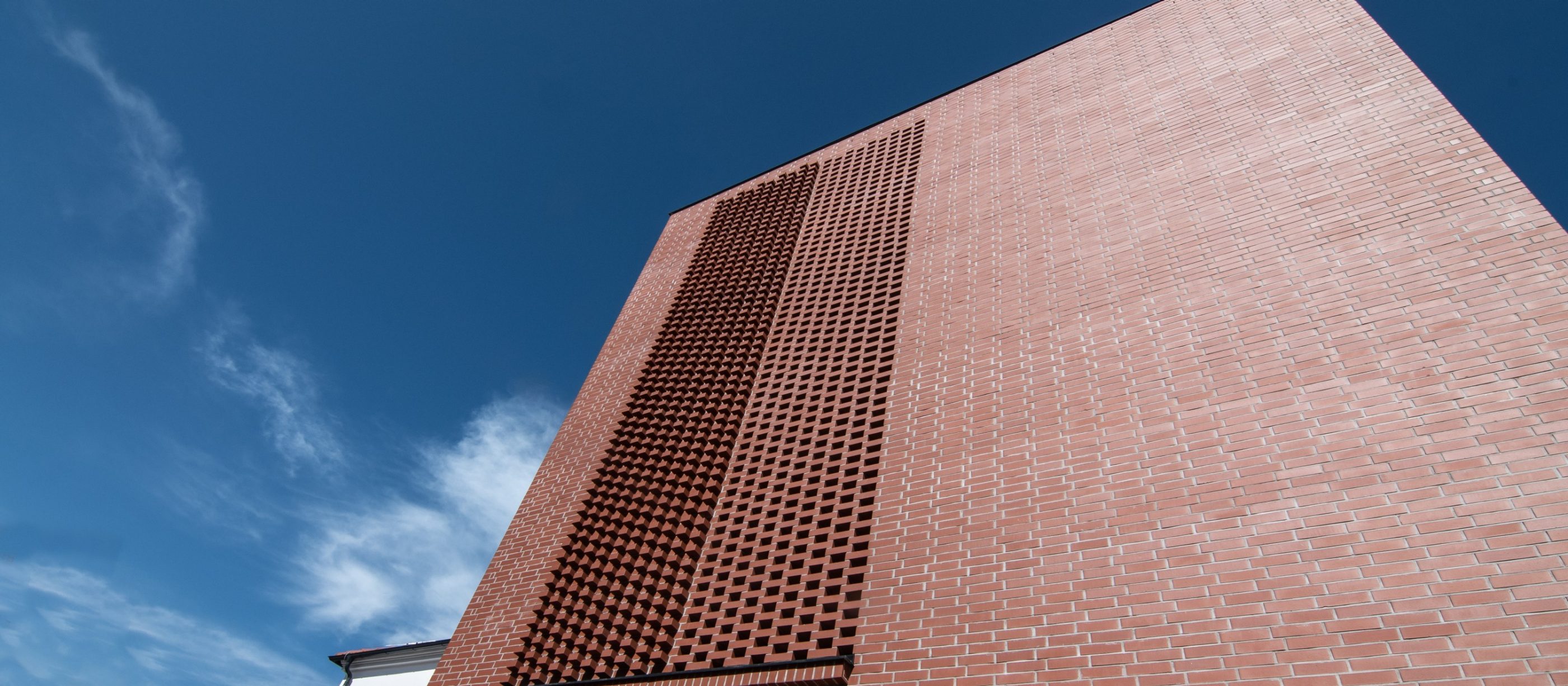 Brick facade with interplay of light and shade