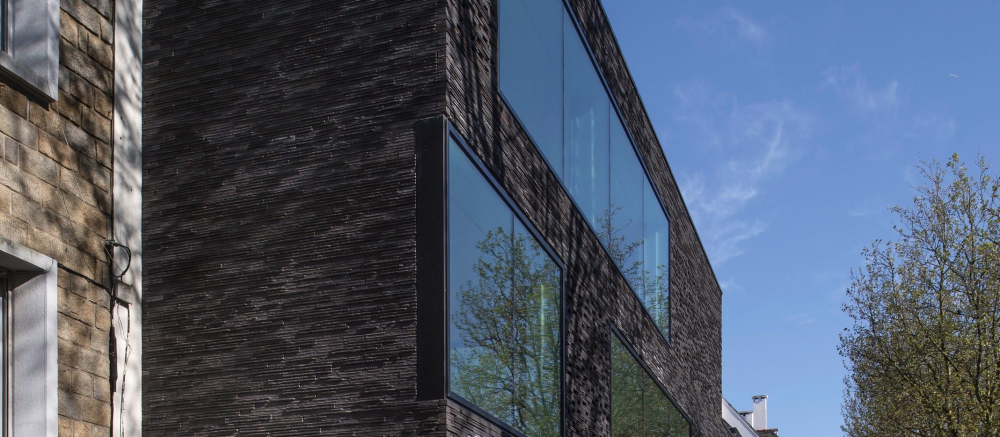 A complex monolith - issue roof and façade