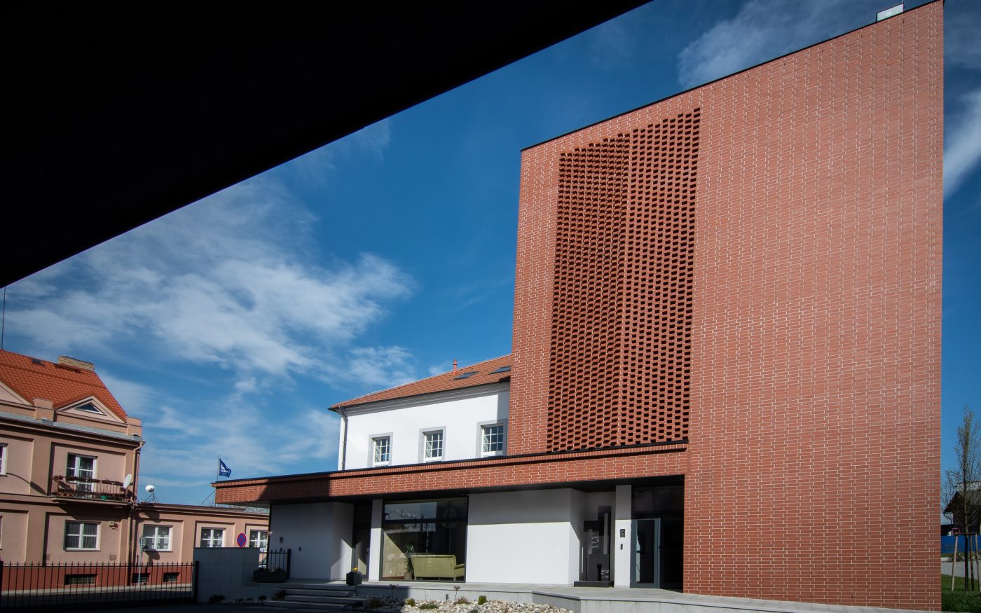 Brick facade with interplay of light and shade
